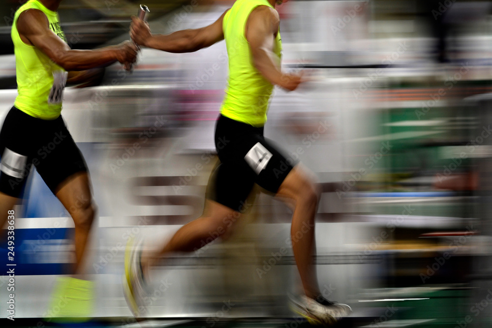 Relay Race Running as Team Towards Victory and Success with Baton Stock ...