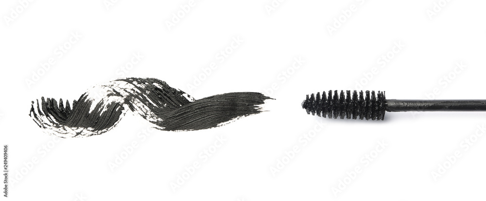 Applicator and black mascara smear for eyelashes on white background ...