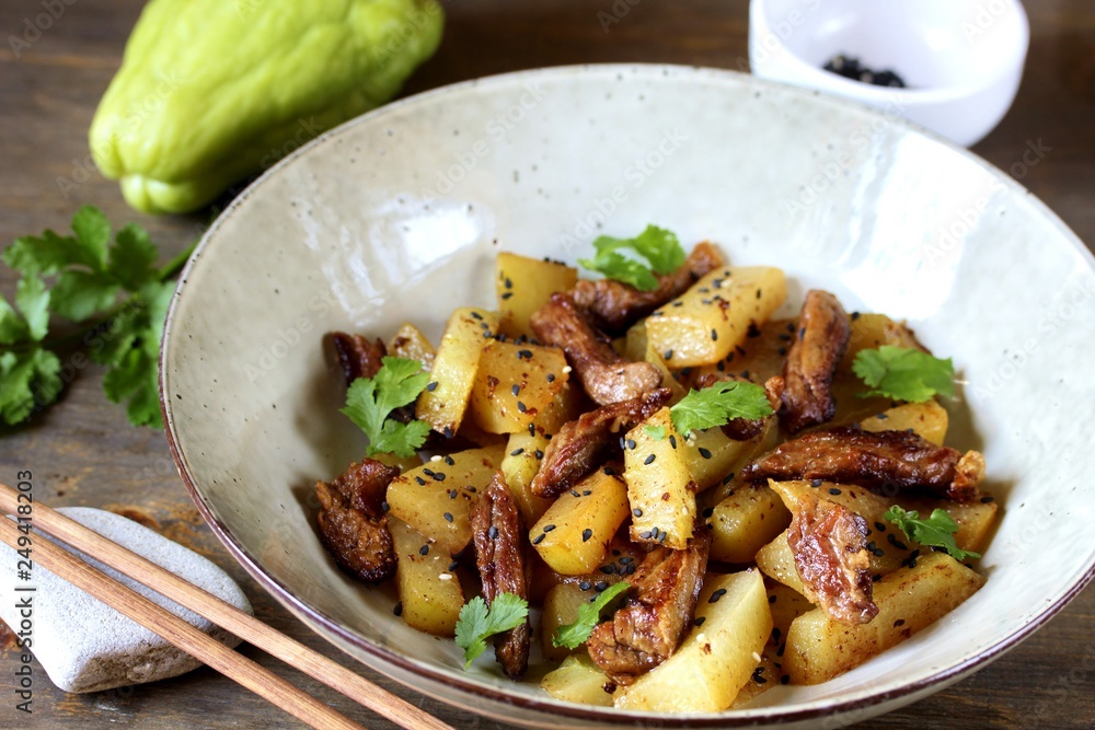chayote with beef and sesame in asian style. The dish is popular in ...