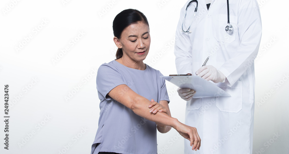 Asian Middle 60s age Woman Patient check up health with Doctor. Aging ...