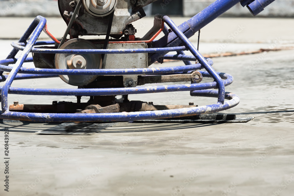 Steel trowel machine for smoothing surface to finish of concrete slab ...