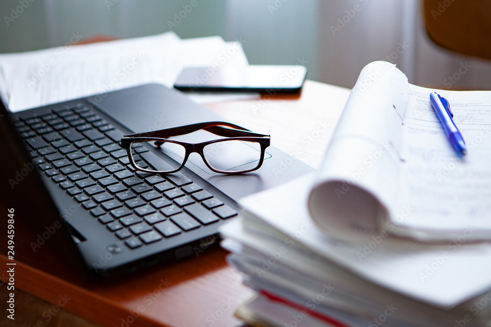 office desk a stack of computer paper reports work forms Stock Photo ...