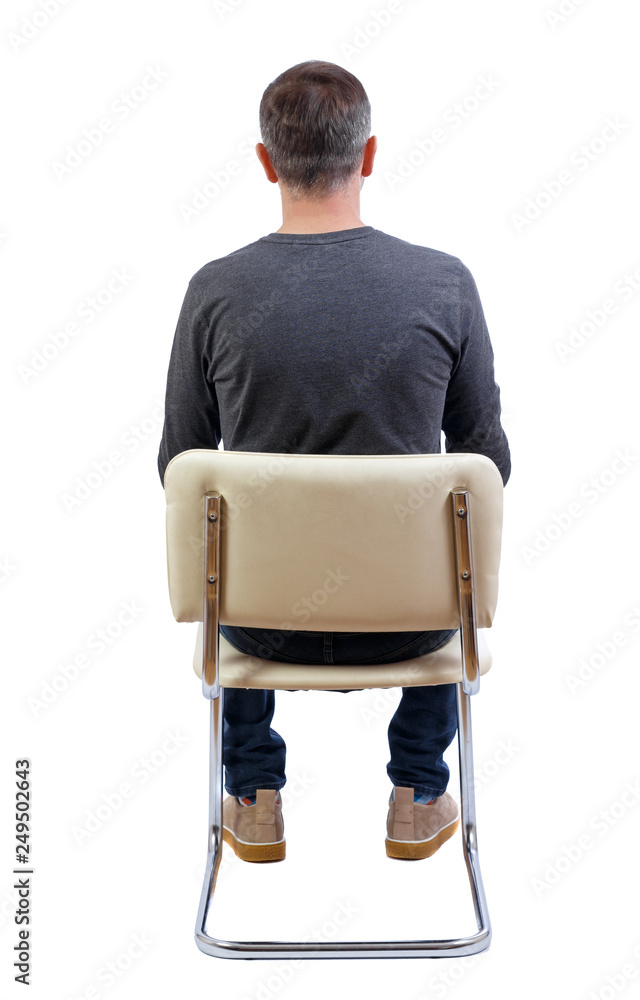 Man Sitting In Chair Back
