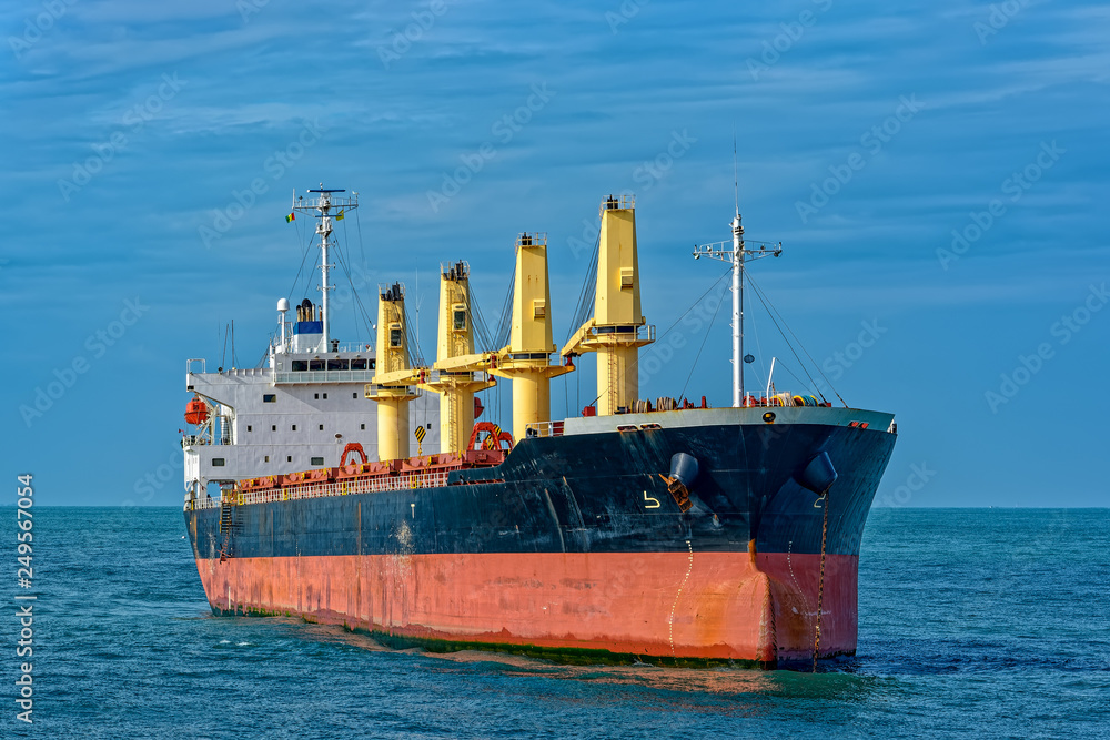 Bulk carrier vessel is awaiting loading of bauxite ore at outer ...