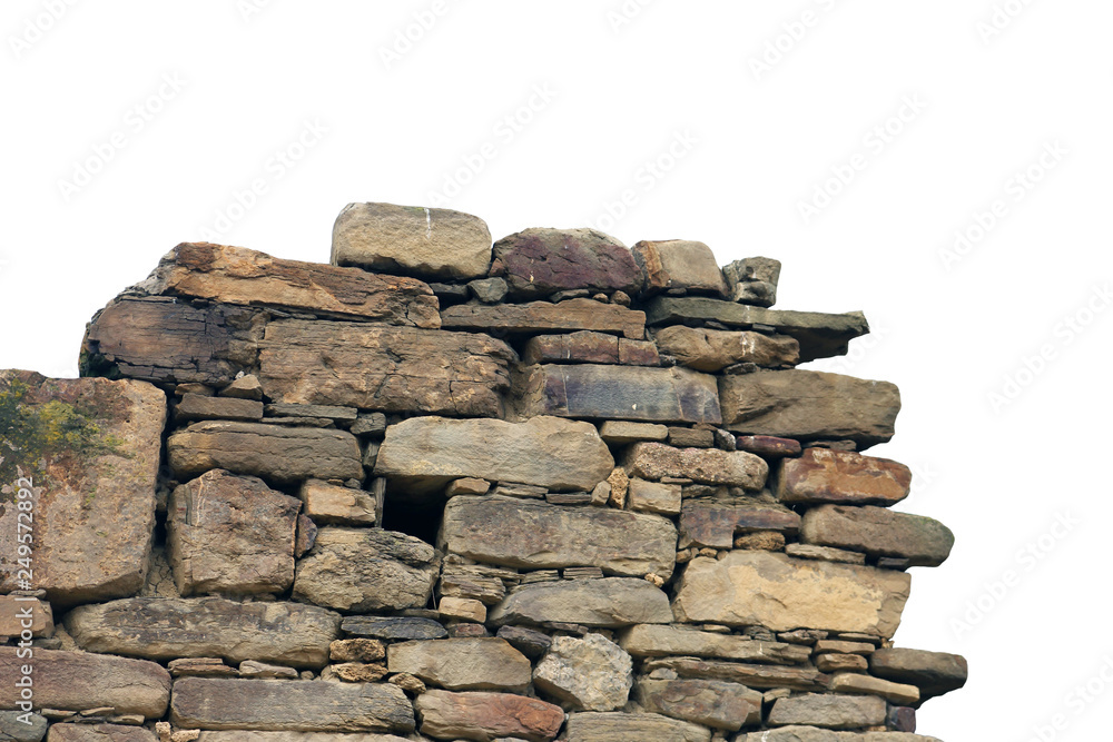 old ancient ruined stonework wall of bricks and stone blocks foreground closeup isolated on ...