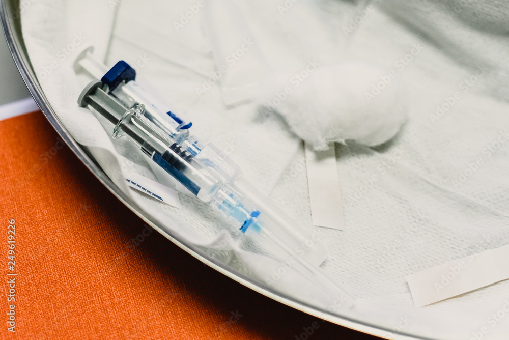 Syringe with diphtheria, tetanus, whooping cough, hepatitis B, polio ...