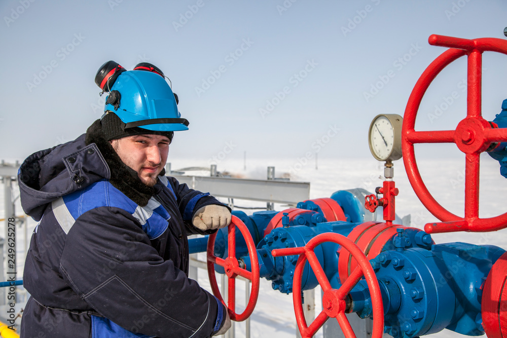 Gas operator, The operator operates the gas well with a torch.The ...
