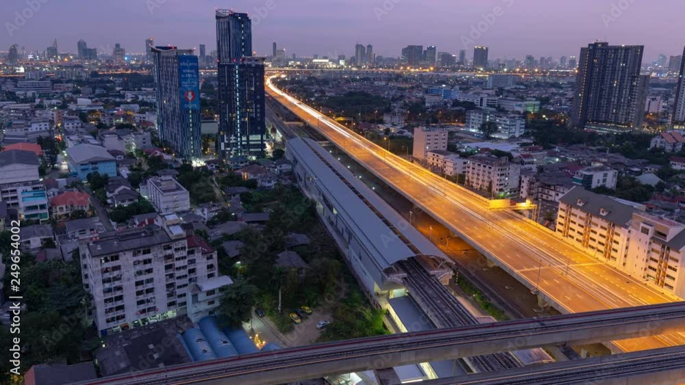 Evening imelapse of the Si Rat-Outer Ring Road Expressway, train tracks ...