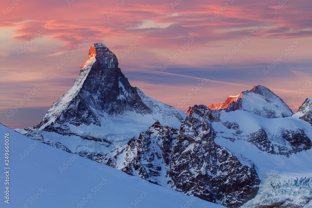 Matterhorn during winter. It is a mountain of the Alps, straddling the ...