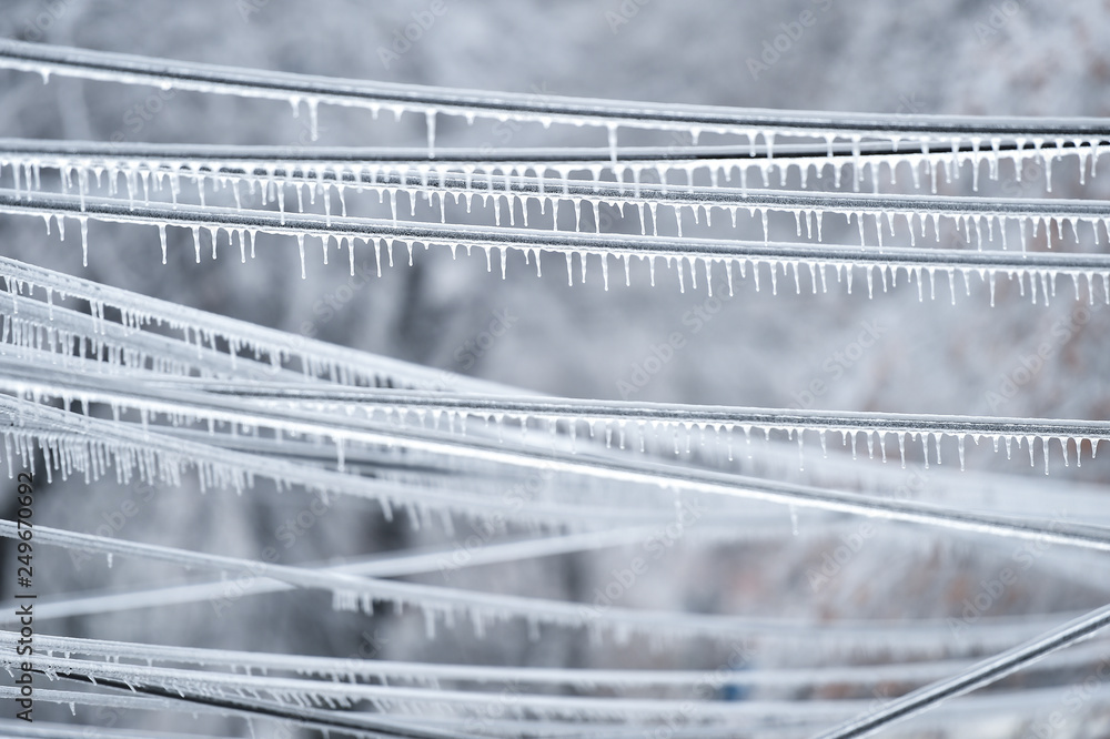 Electricity cables covered in ice after frozen rain phenomenon Stock ...