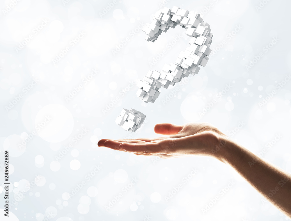 Answer all your questions concept presented by question sign in palm ...