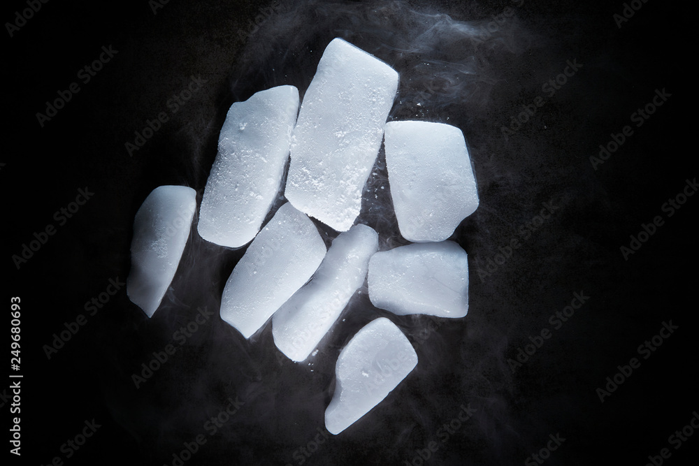 Dry ice on black background Stock Photo | Adobe Stock