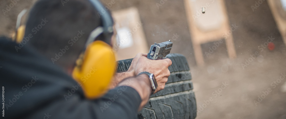 Advanced outdoor tactical shooting on target around barrier and wall ...