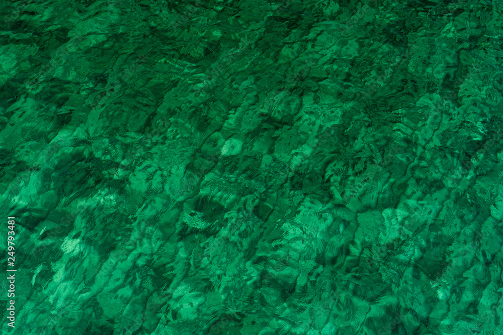 Green abstract texture background of emerald green sea water. Top view ...