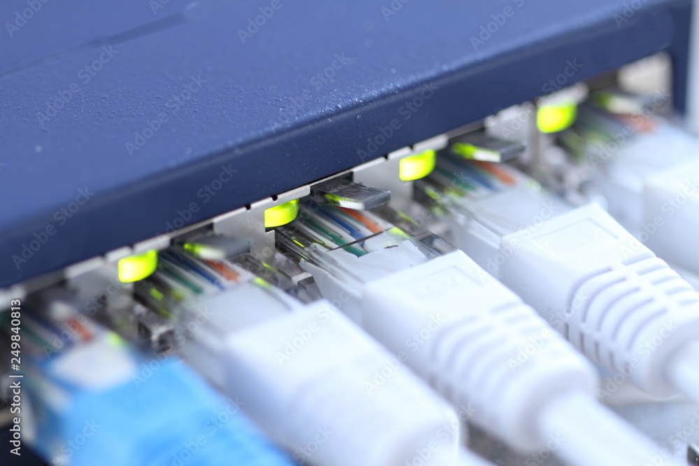 RJ45 Stecker in einem Router Stock Photo | Adobe Stock