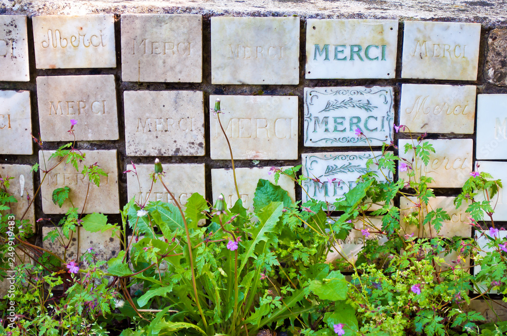 Many white marble boards with a French word merci Stock Photo | Adobe Stock