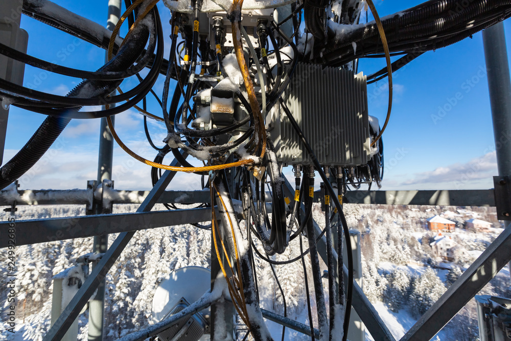 Telecommunication tower or mast with microwave, radio panel antennas ...