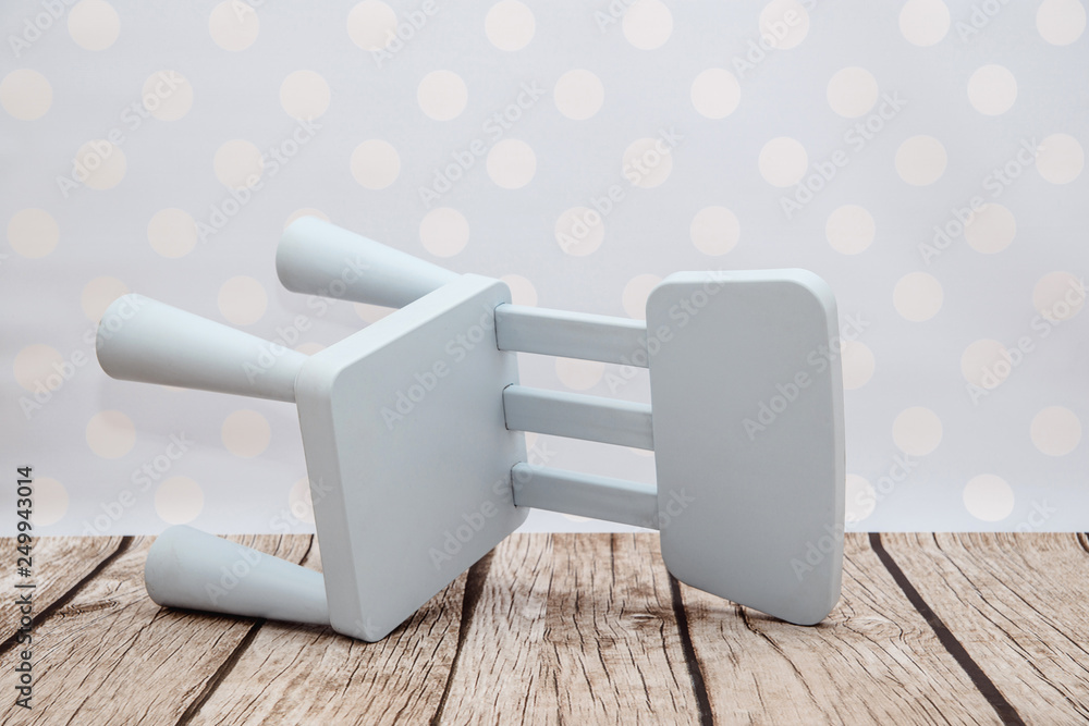 Blue pastel chair on a pastel background side view. Pastel colors. Baby ...