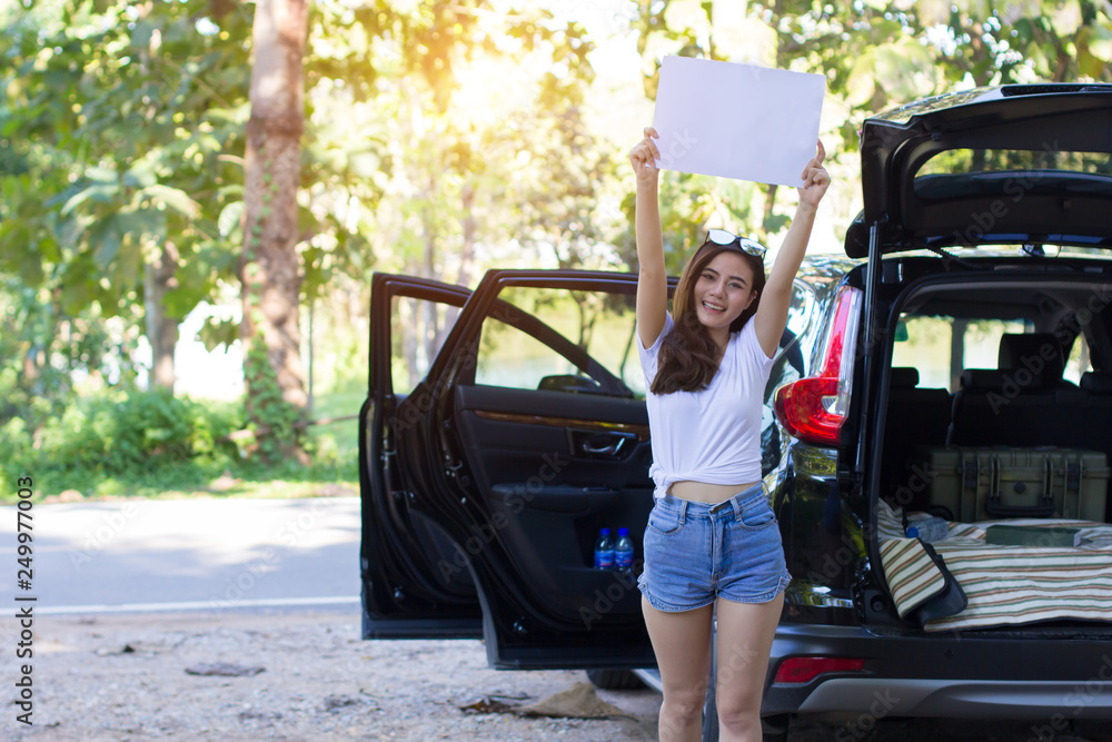 Young girl is waving car for help her broken car Stock Photo | Adobe Stock