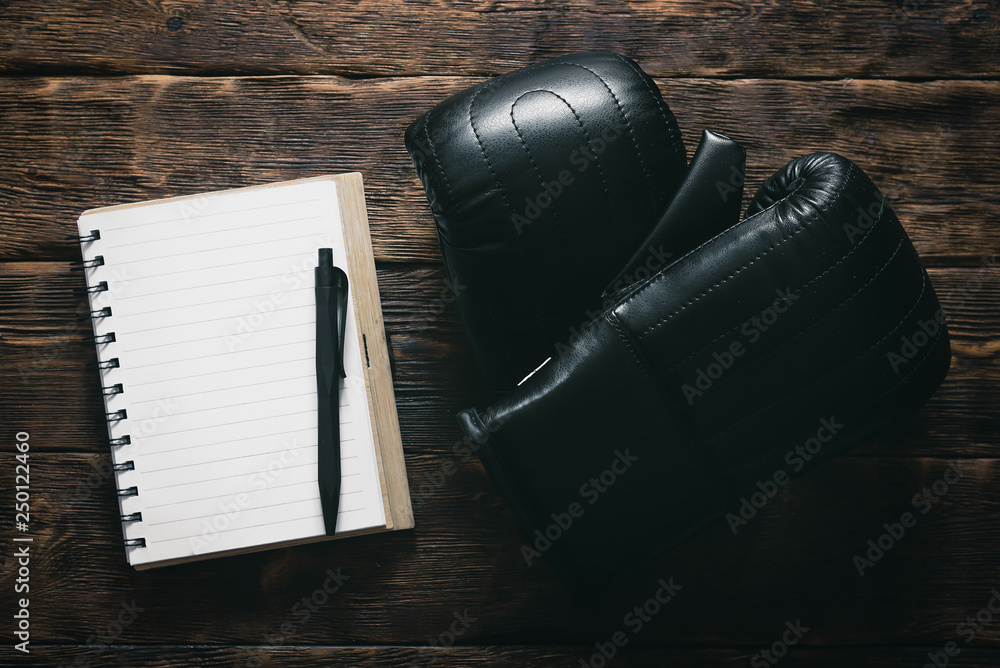 Blank notepad with empty sheets for boxing exercise list and boxing ...