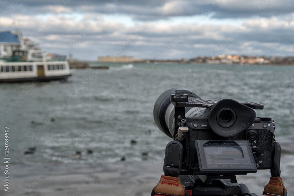 Video cameraman working with his professional equipment. professional ...