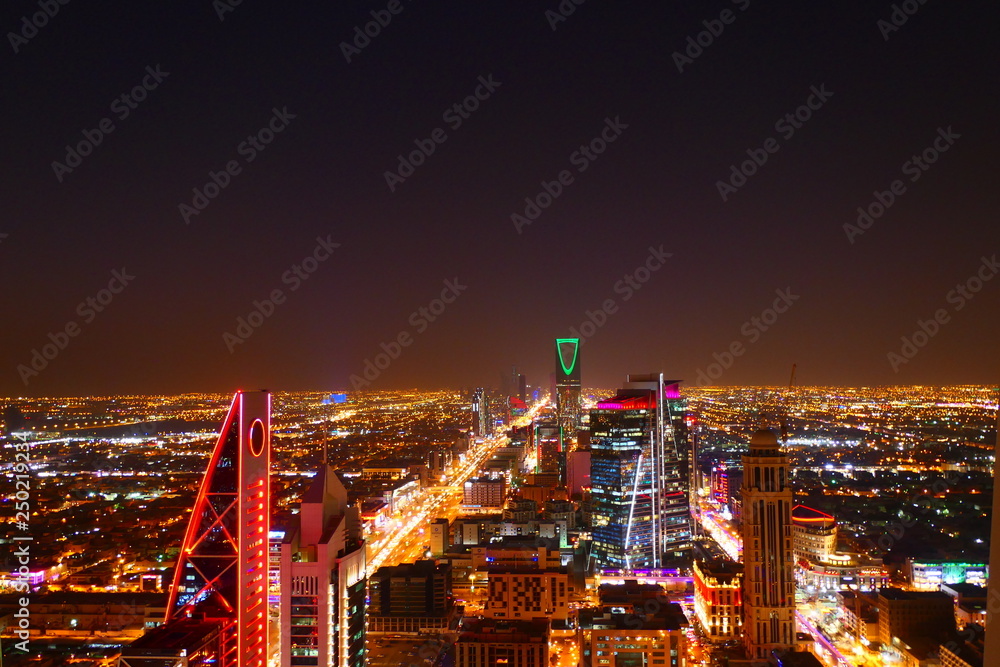 Panorama view to the skyline of Riyadh by night, with skyscrapers in ...