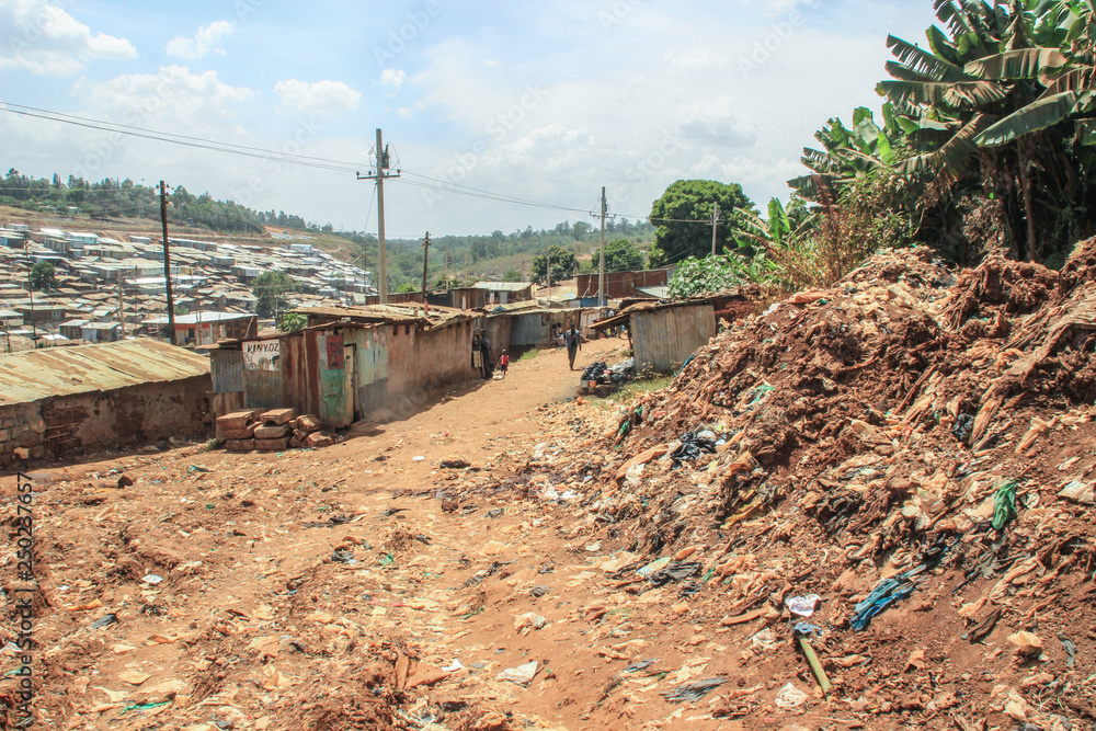 Kibera, Nairobi, Kenya - February 13, 2015: Huge heaps of burning ...