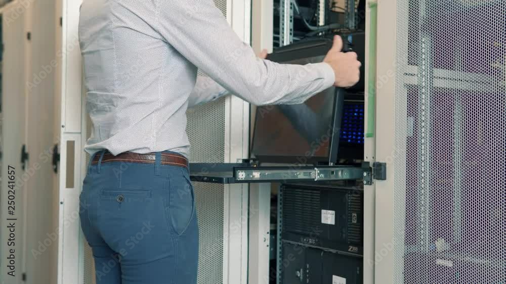 Server IT Engineer In Data Center Server Room.Network Engineer Working ...