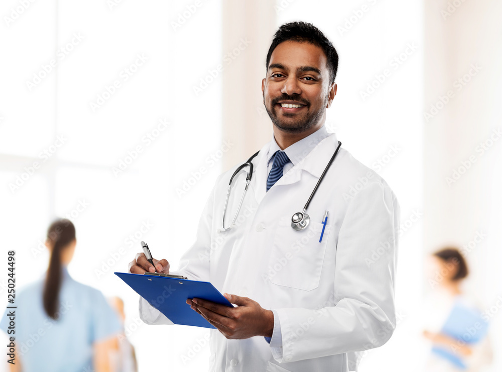 medicine, profession and healthcare concept - smiling indian male ...