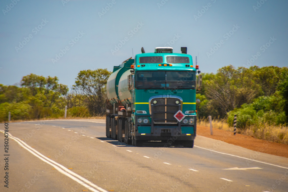 Big Road Train in the Australian Outback with trailer bringing fuel to ...