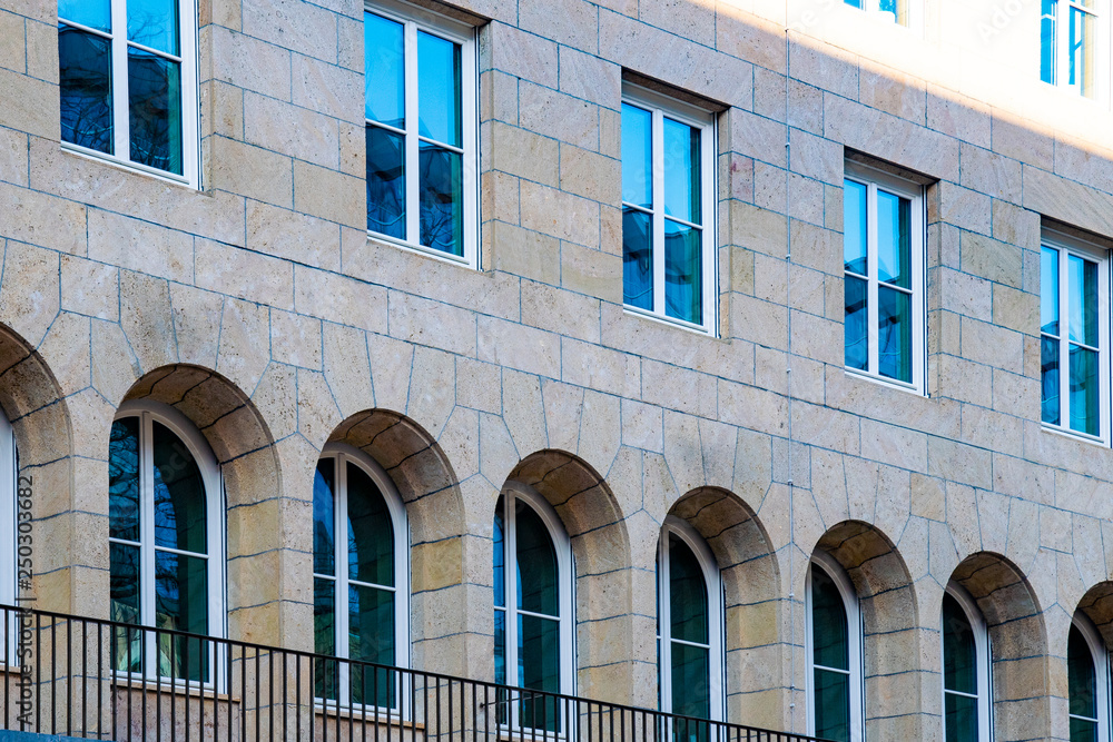 Architecture with rectangular and oval windows on a brick house Stock ...