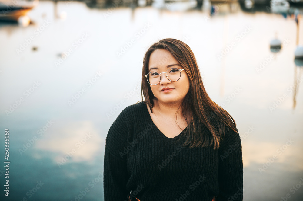 Outdoor portrait of asian plus size model posing by the lake Stock ...