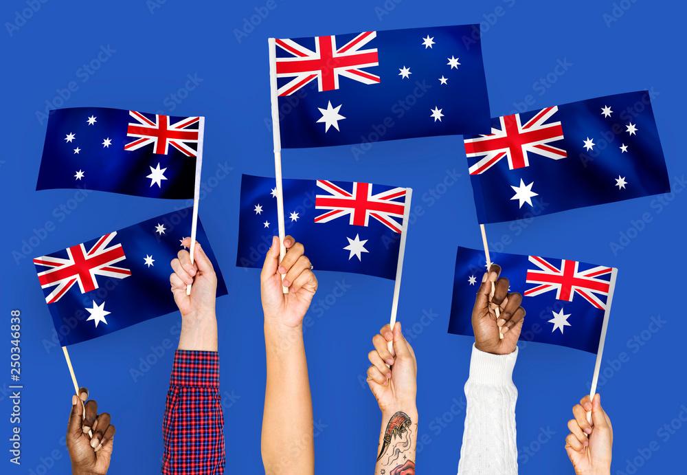 Hands waving the flags of Australia Stock Photo | Adobe Stock