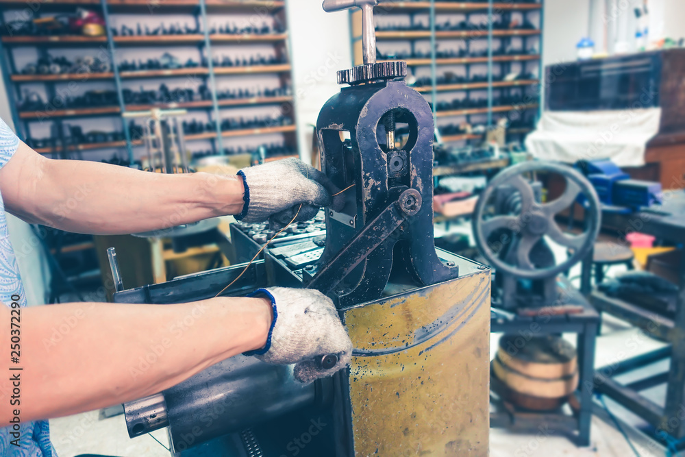 Gold melting and gold bar making and gold plate rolling Stock Photo ...