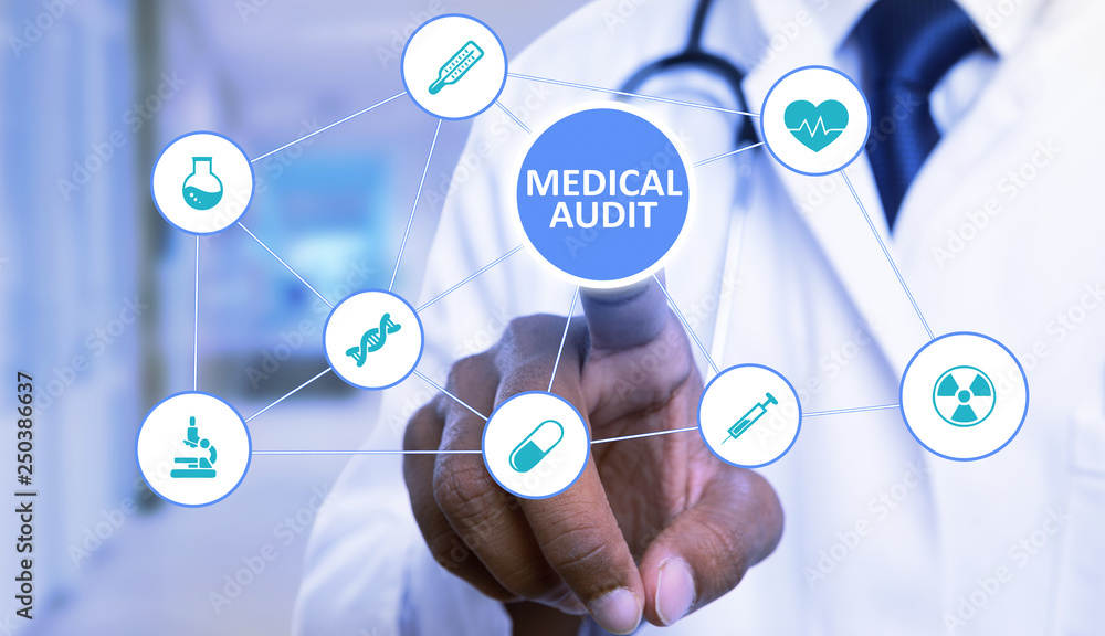 Finger touching medical audit button on screen with symbol network ...