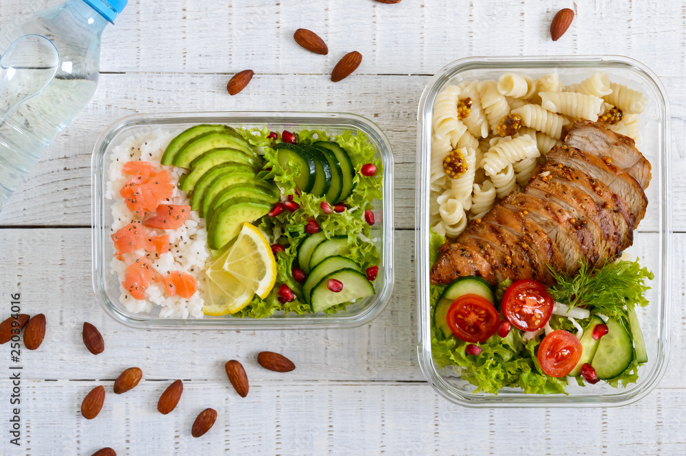 Different types of lunch boxes on a white wooden background. Top view ...
