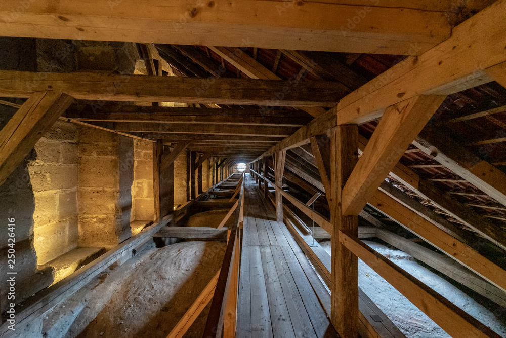 Wooden structures (rafters and beams) of the attic of an old house ...