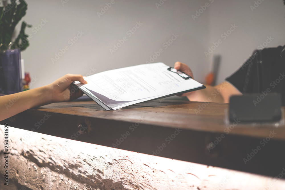 Receptionist's sent the documents to guest for signing and filling up ...