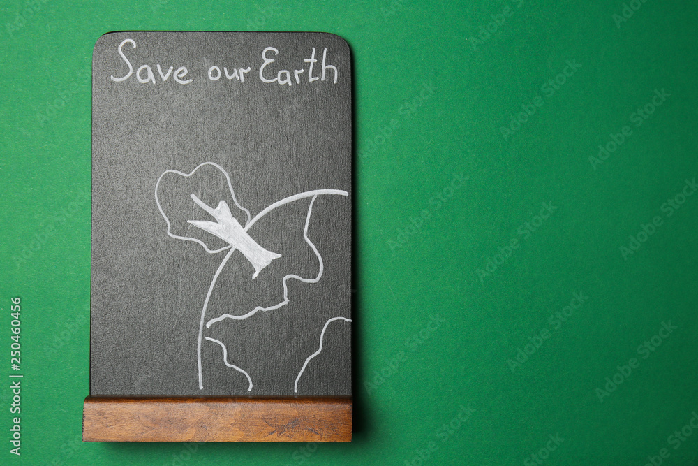 Chalkboard with picture and text SAVE OUR EARTH on color background ...