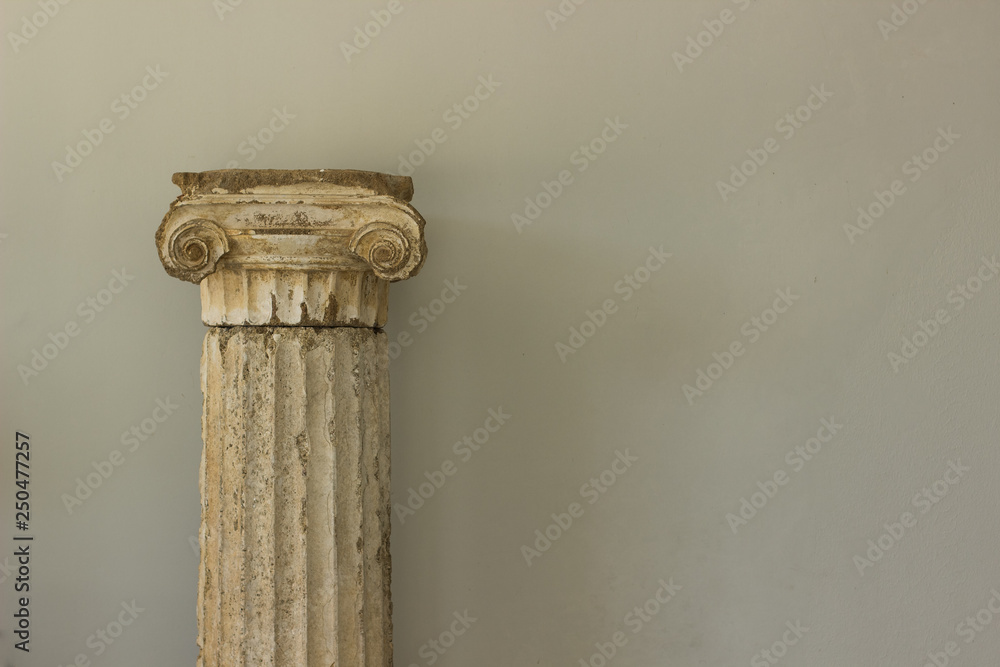antique marble column from ancient Greece times exhibit object on white ...