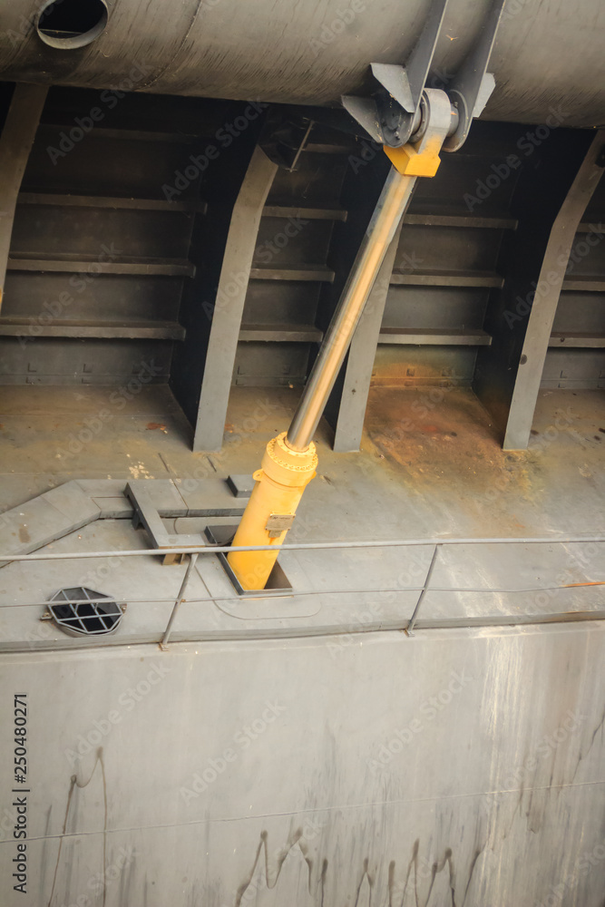 Hydraulic water gate is shifting up to allow water flow through in the ...