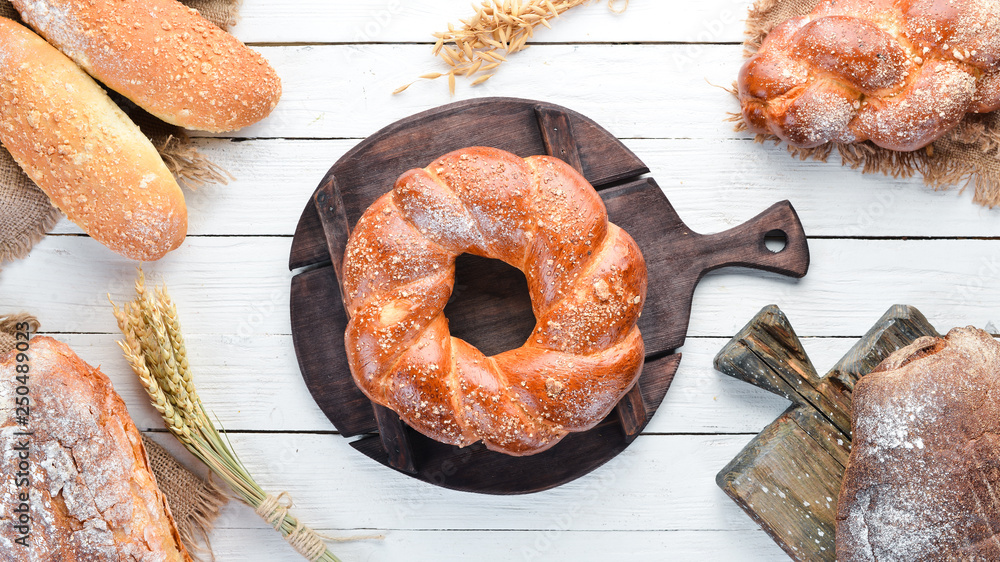 Round braided loaf of bread flour. Top view. Free space for your text ...