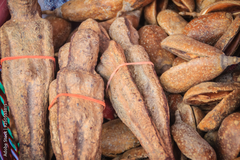 Dried Nariphon fruits for sale at the amulet market, Thailand. The ...