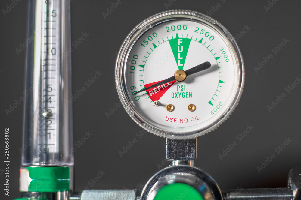 Close-up of medical oxygen flow meter shows low oxygen or an nearly ...