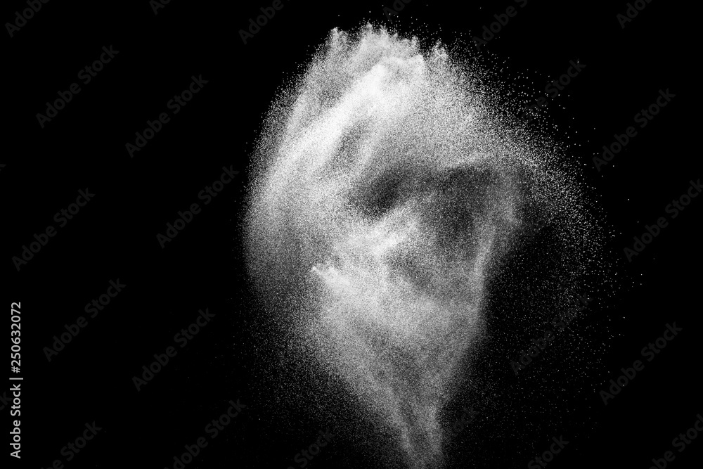 Bizarre forms of white powder explosion cloud against black background ...
