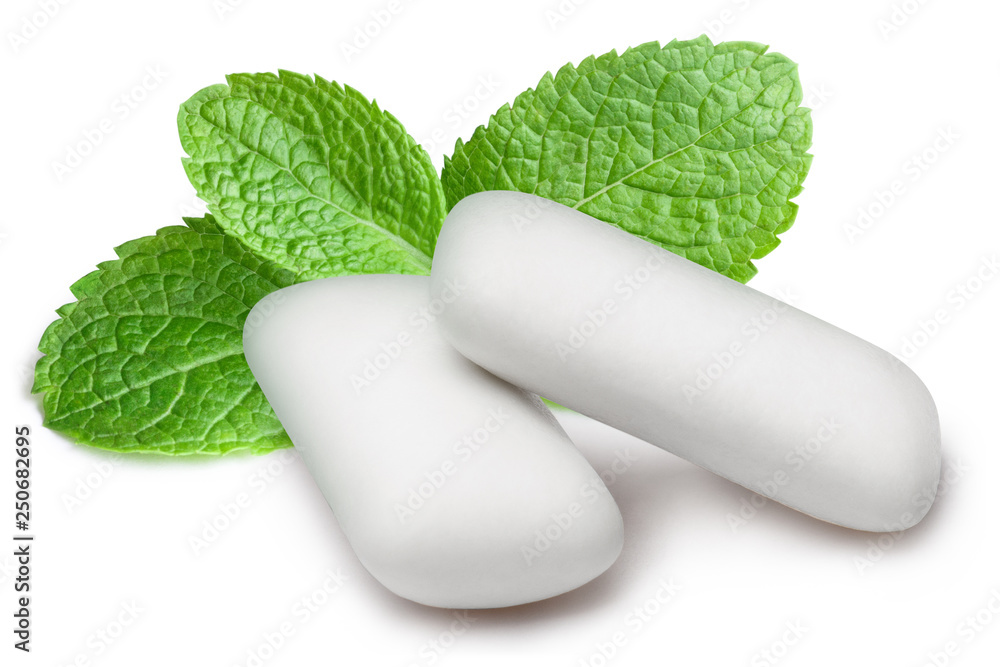Two chewing gum pieces with fresh mint leaves, isolated on white ...