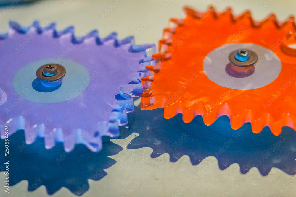 Sample product of plastic cogwheel gears for education. Colorful ...