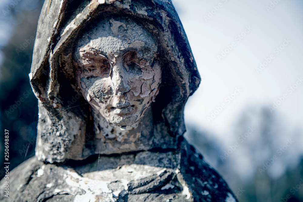 Vintage statue of sad woman in grief. Religion, faith, suffering, love ...