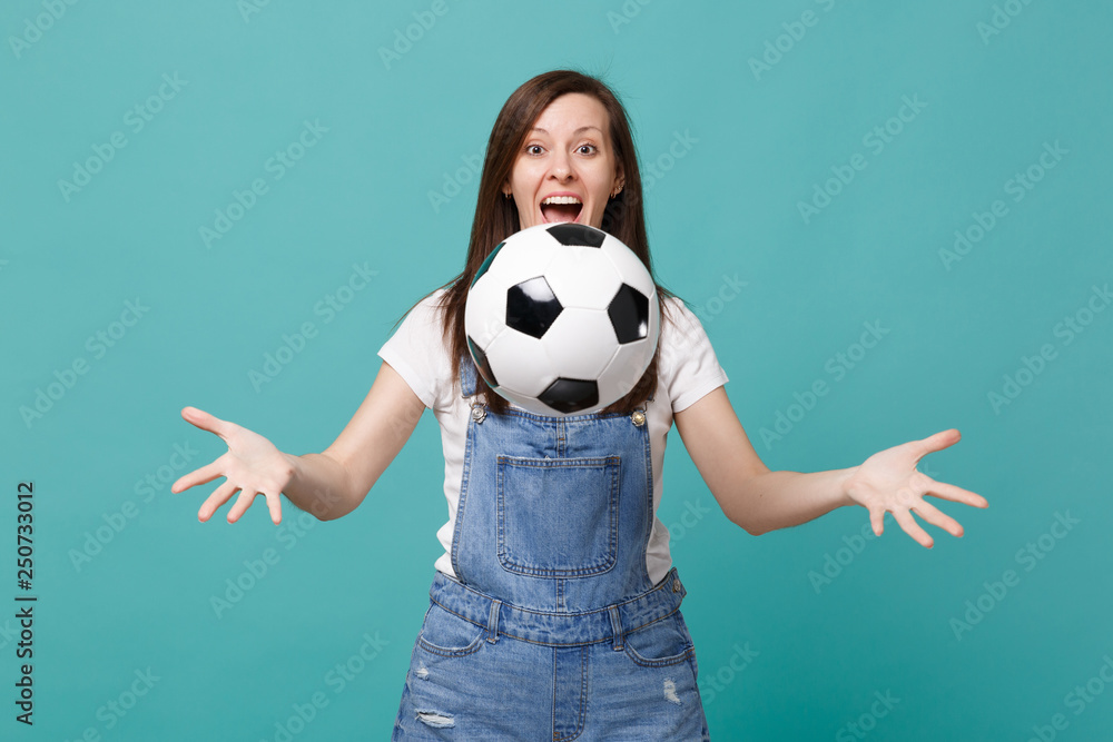 Surprised funny young woman football fan cheer up support favorite team ...