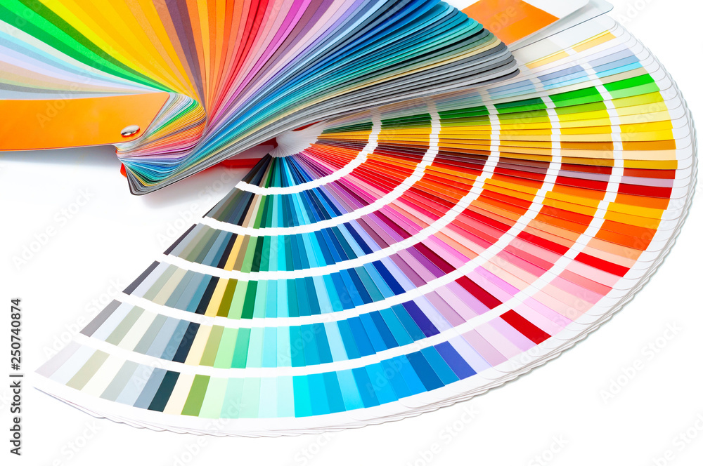 The catalog of paints with a various color palette. On a white ...